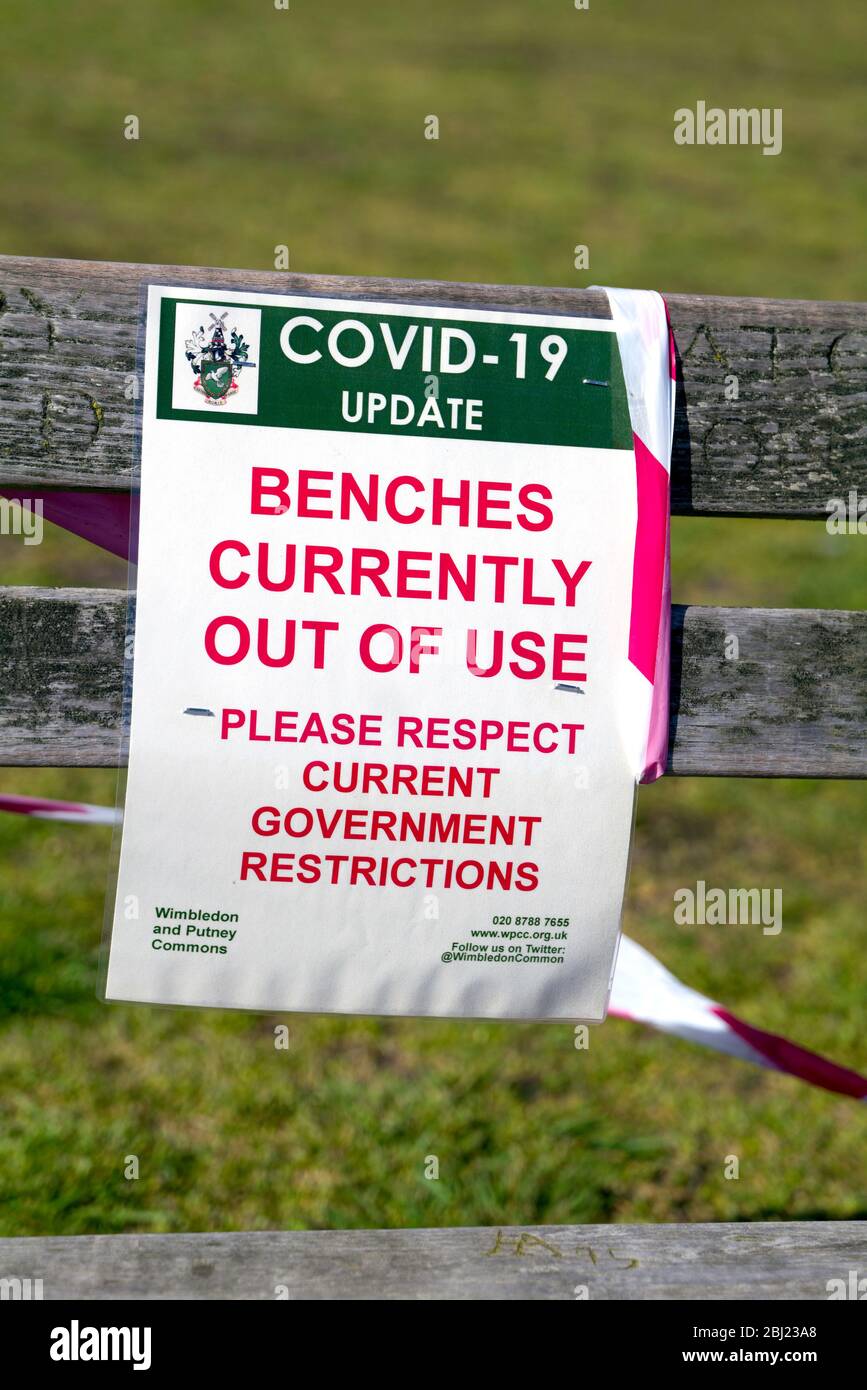 Sign on Wimbledon Common telling people not to sit on the benches ...