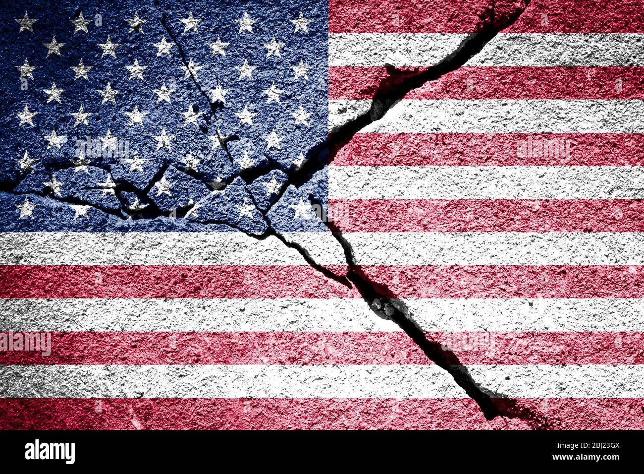 USA flag on cracked concrete wall. The concept of crisis, default ...