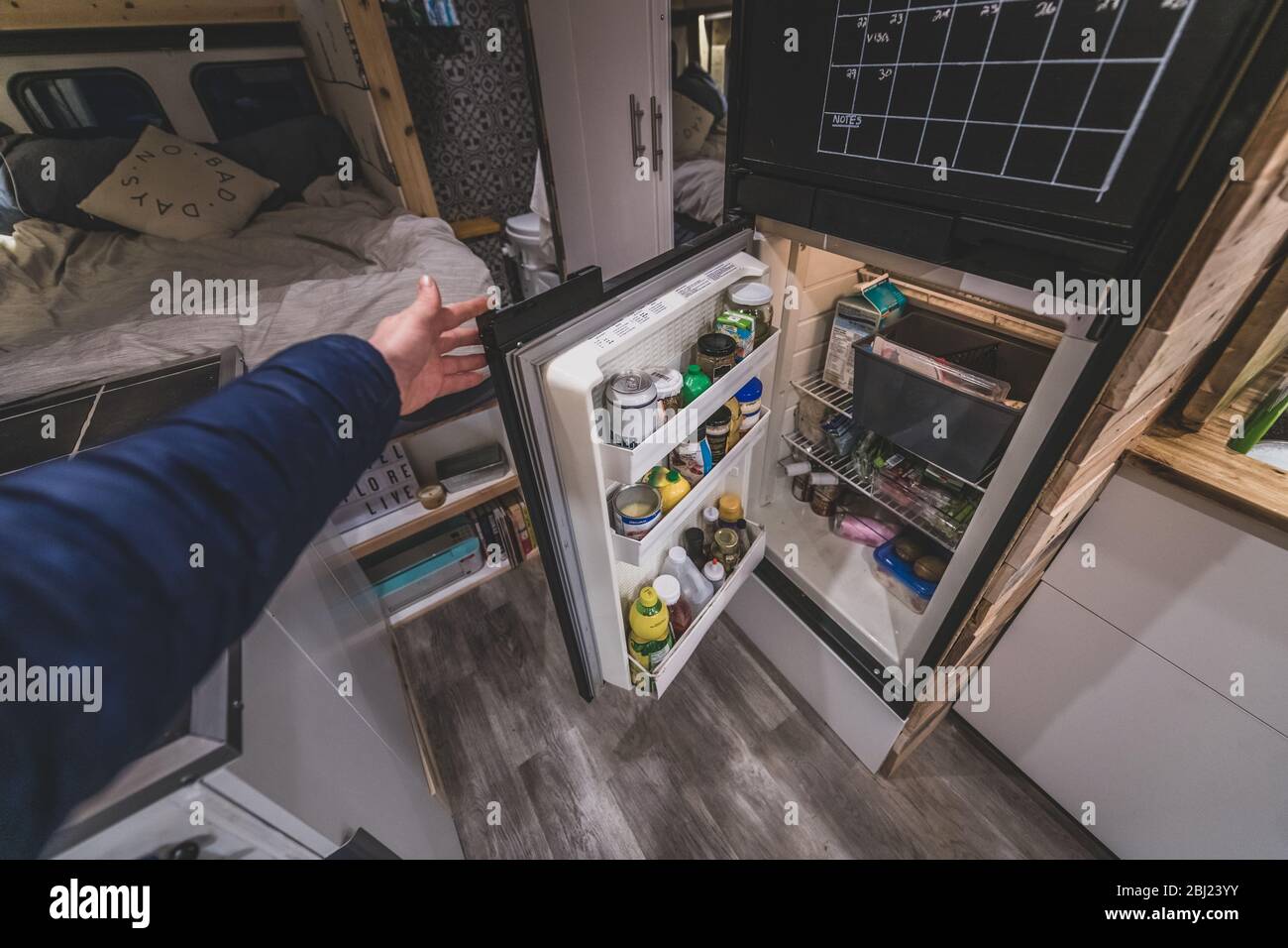 Woman Opening Fridge Door High Resolution Stock Photography and Images ...