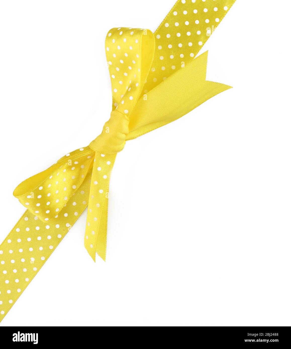 Yellow ribbon bow isolated on white Stock Photo - Alamy