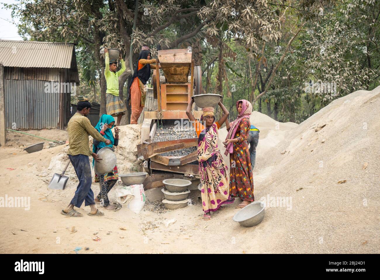 Jaflong / Bangladesh - January 28, 2019: Bengali women working hard in ...
