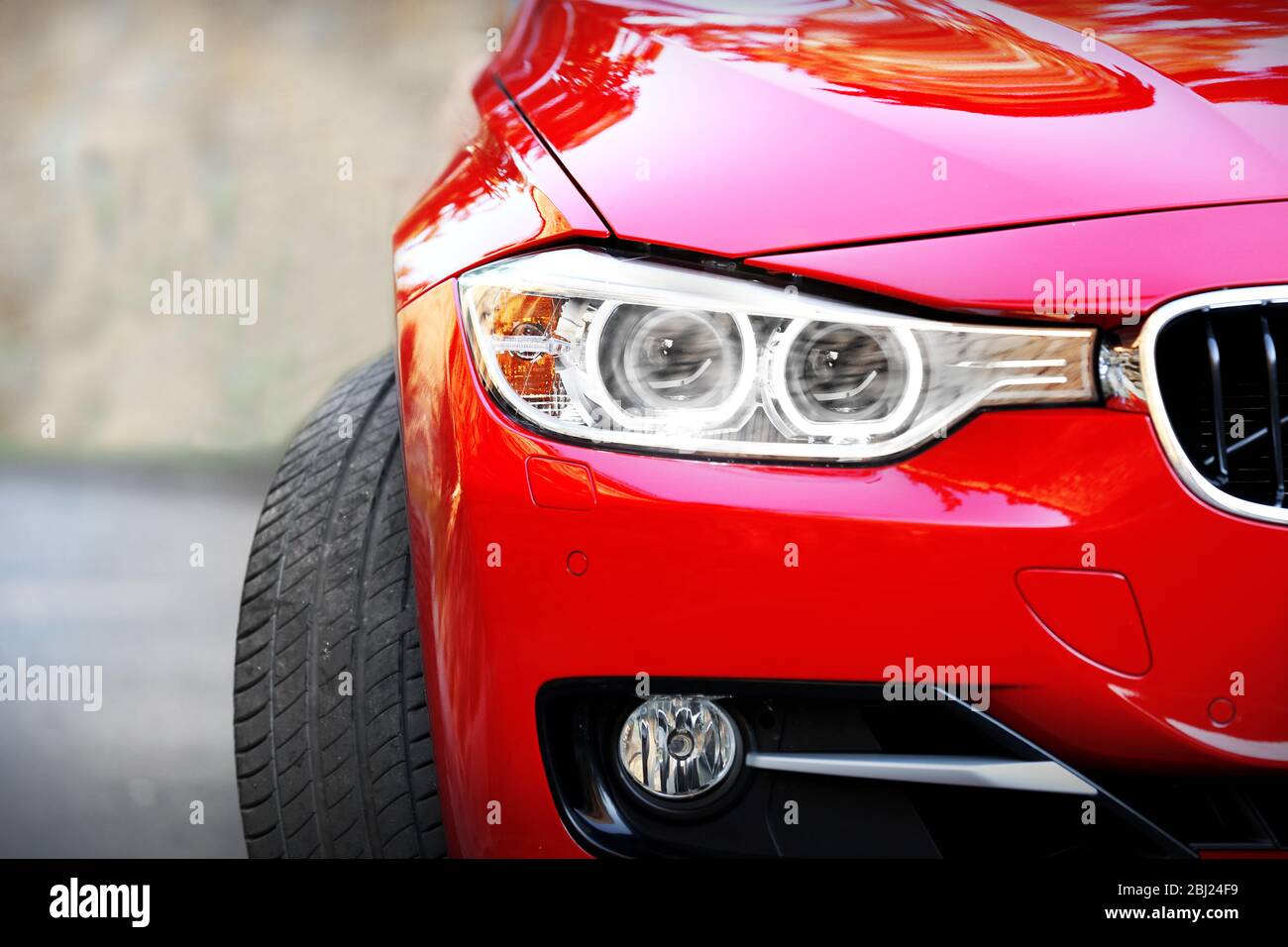 Red car, outdoors Stock Photo - Alamy
