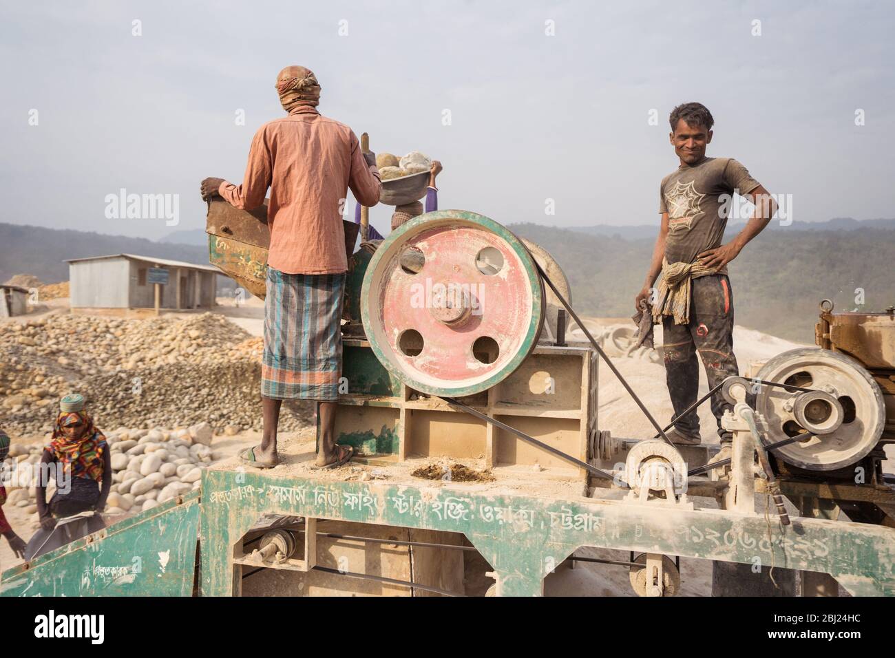 Jaflong / Bangladesh - January 28, 2019: Bengali men working hard in ...
