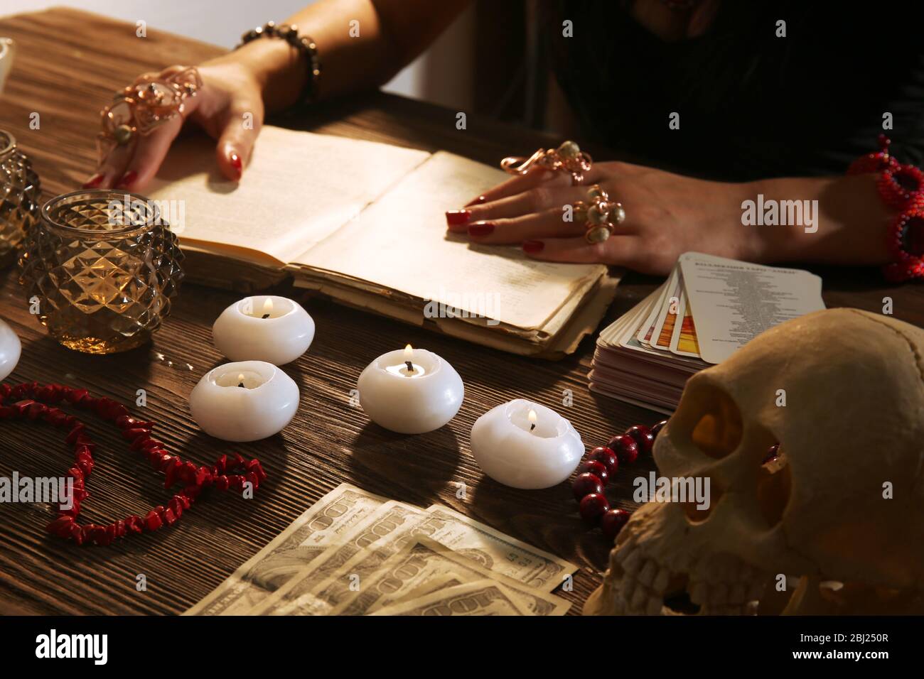 Witch - fortune teller reading fortune close up Stock Photo - Alamy