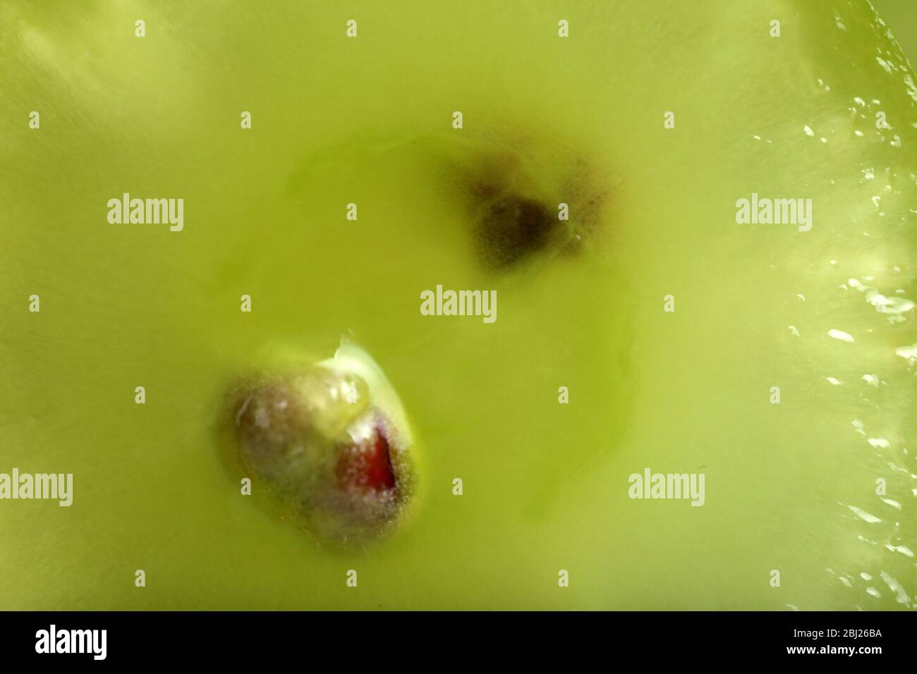 Grape slice background Stock Photo - Alamy