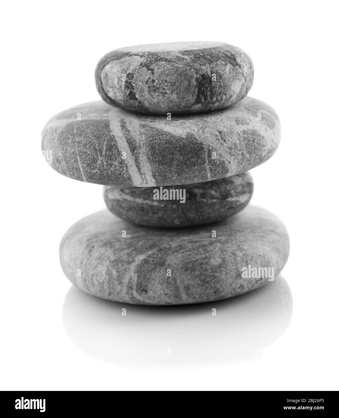 Stack of spa stones isolated on white Stock Photo - Alamy