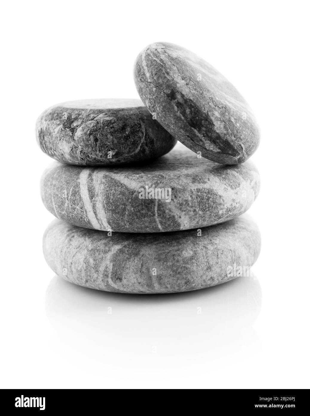 Stack of spa stones isolated on white Stock Photo - Alamy