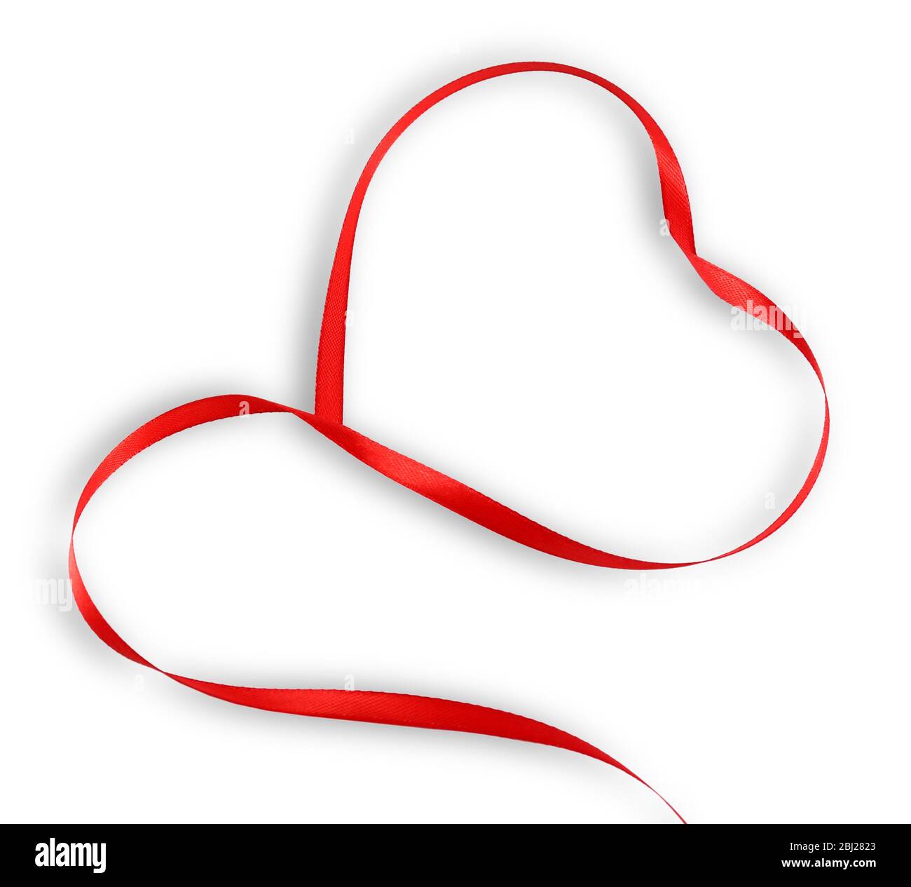 Red ribbon in shape of heart isolated on white Stock Photo - Alamy