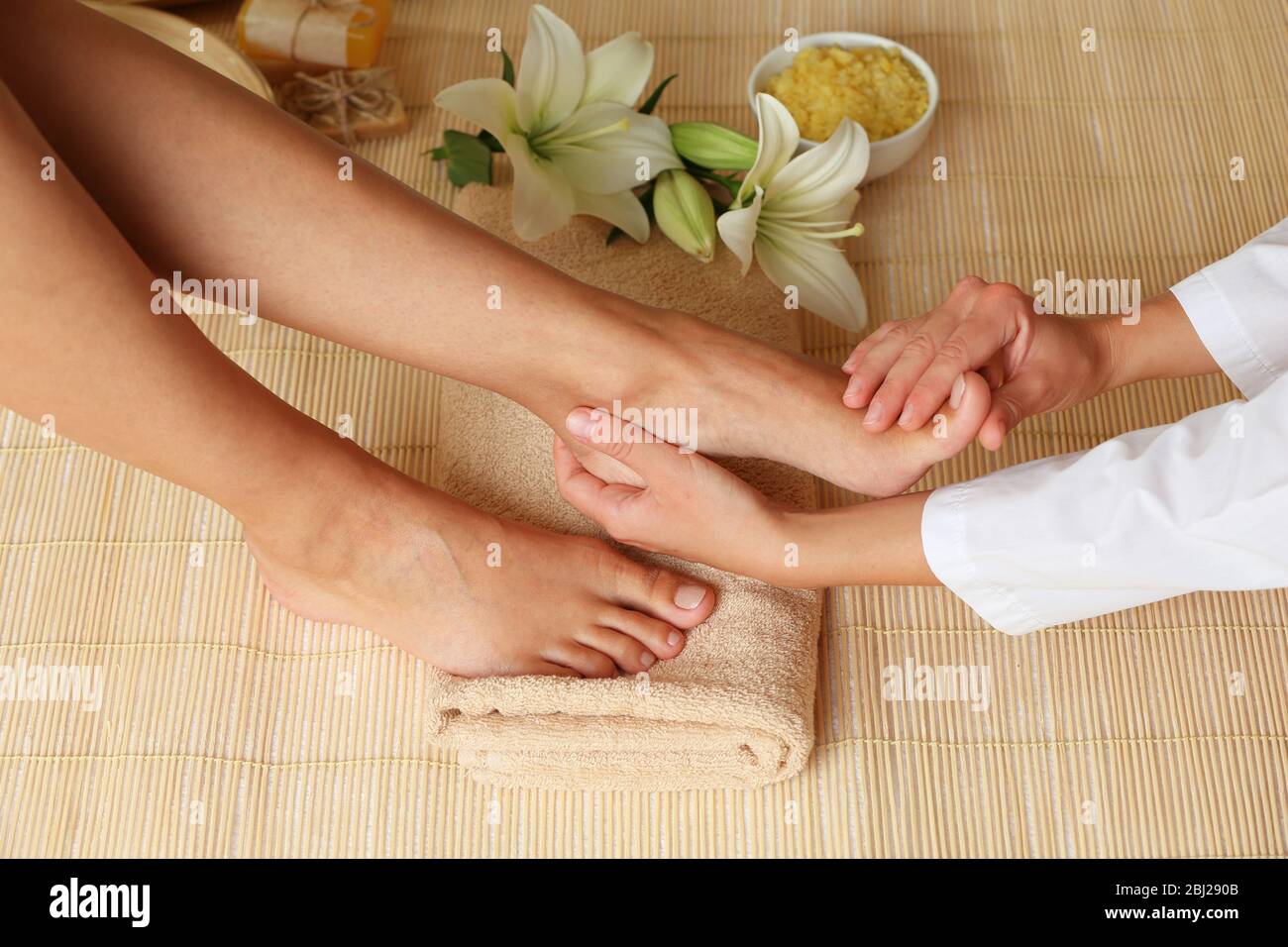 Enjoy relaxing leg massage hi-res stock photography and images - Alamy
