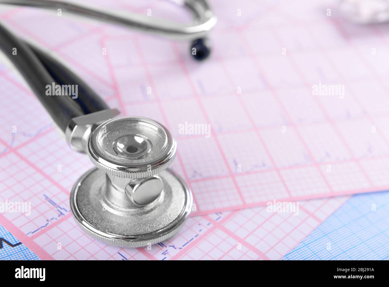 Stethoscope on cardiogram sheet, closeup Stock Photo - Alamy