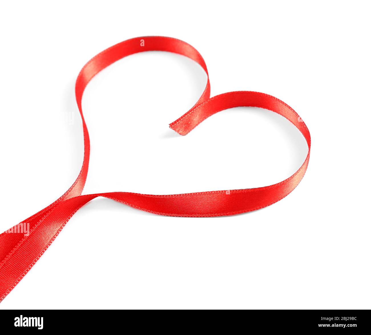 Red heart ribbon isolated on white Stock Photo - Alamy