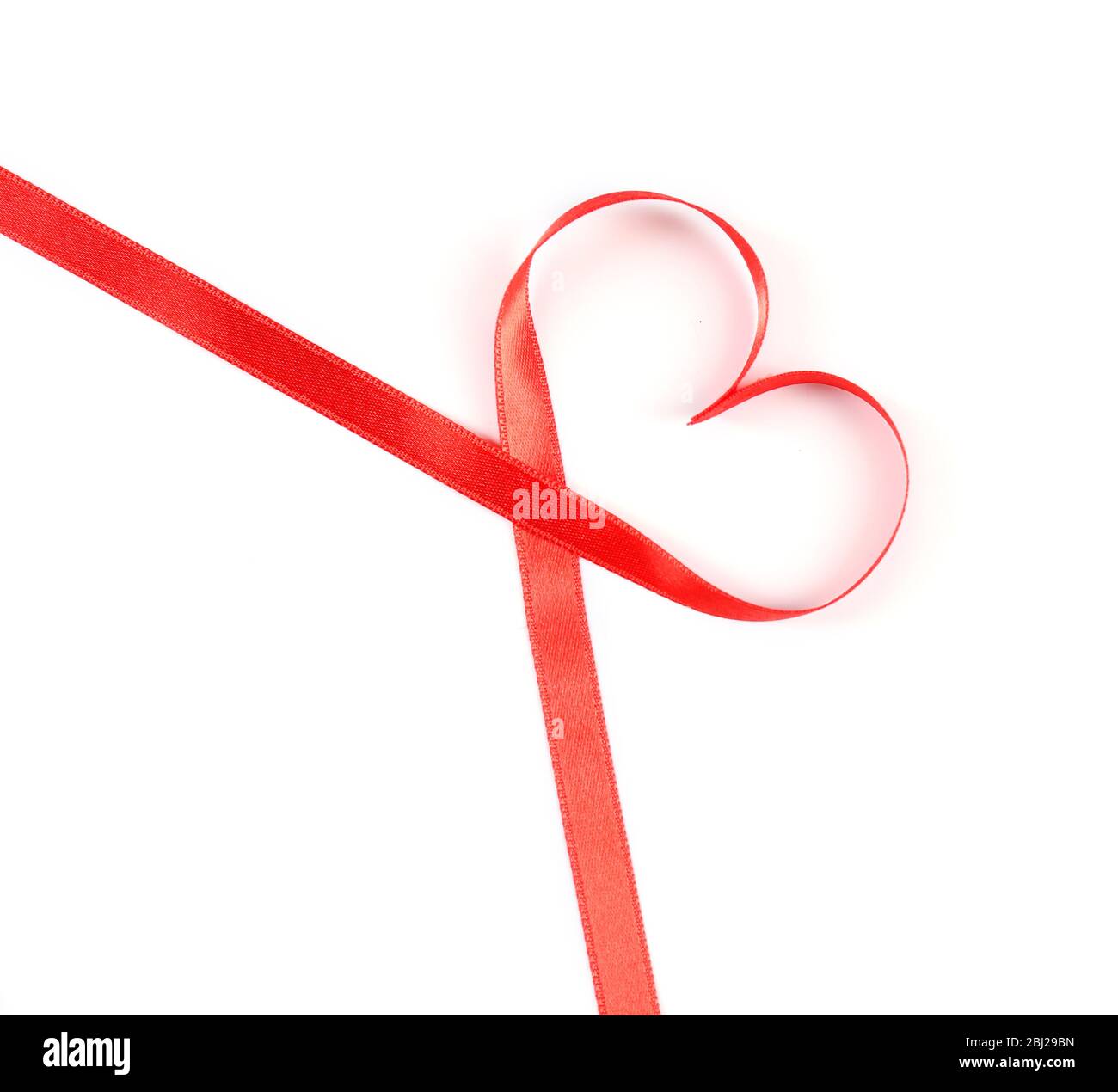 Red heart ribbon isolated on white Stock Photo - Alamy