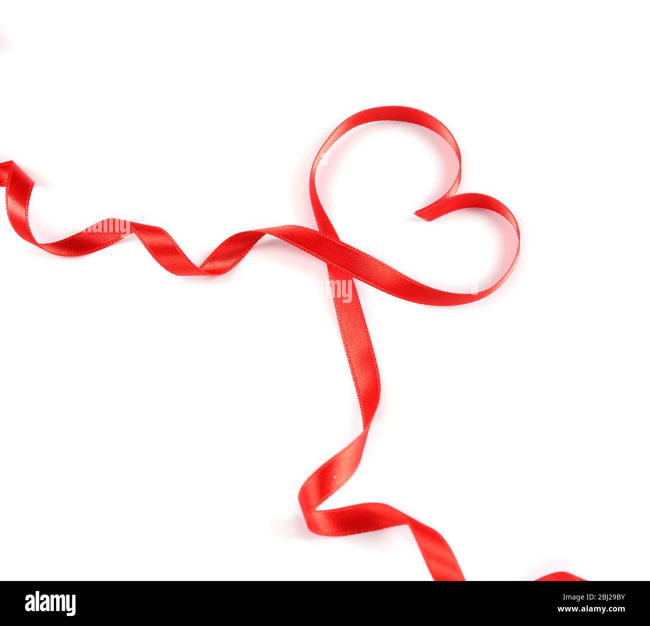 Red heart ribbon isolated on white Stock Photo - Alamy