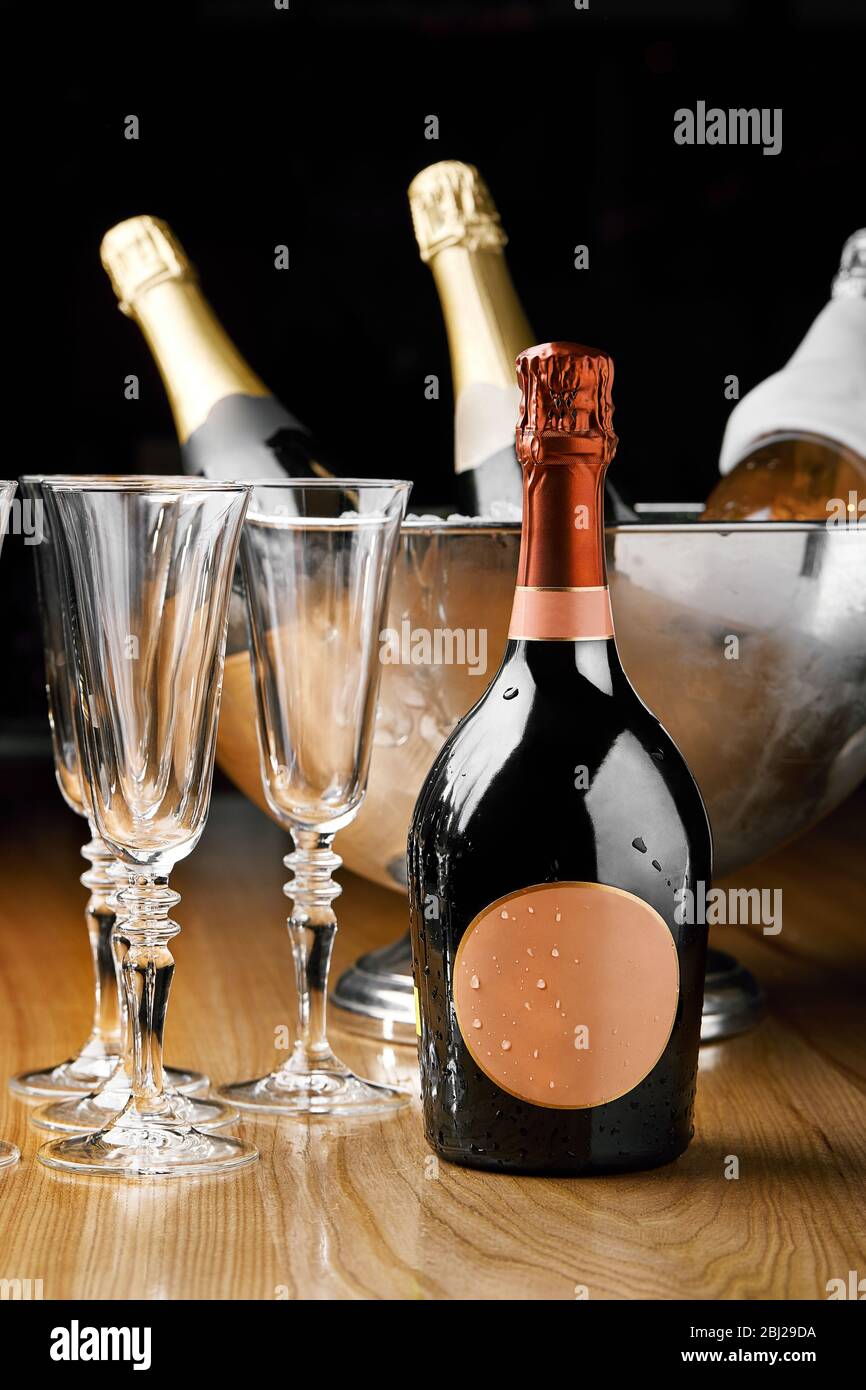 Bottle of champagne and glasses for champagne, on the background of a ...