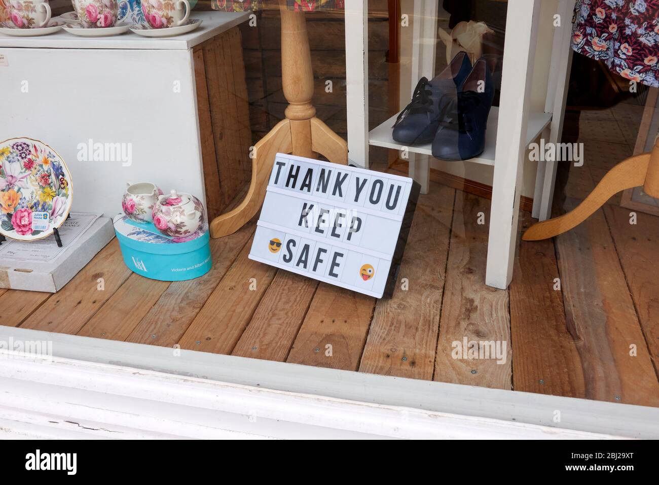 Thank you keep safe sign with emojis in shop window Stock Photo - Alamy