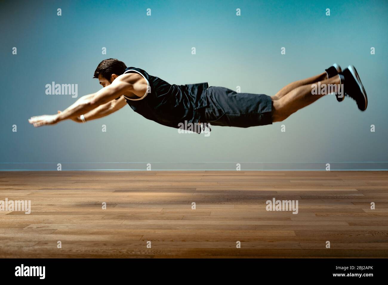 The athlete gave a push-up exercise with a jump. Flight phase ...