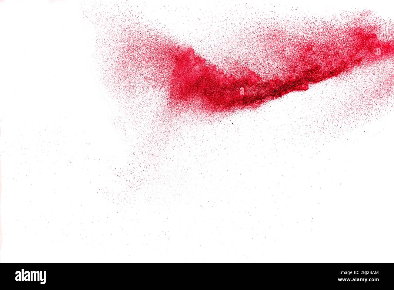 Red dust particles explosion on white background.Red sand splatter ...