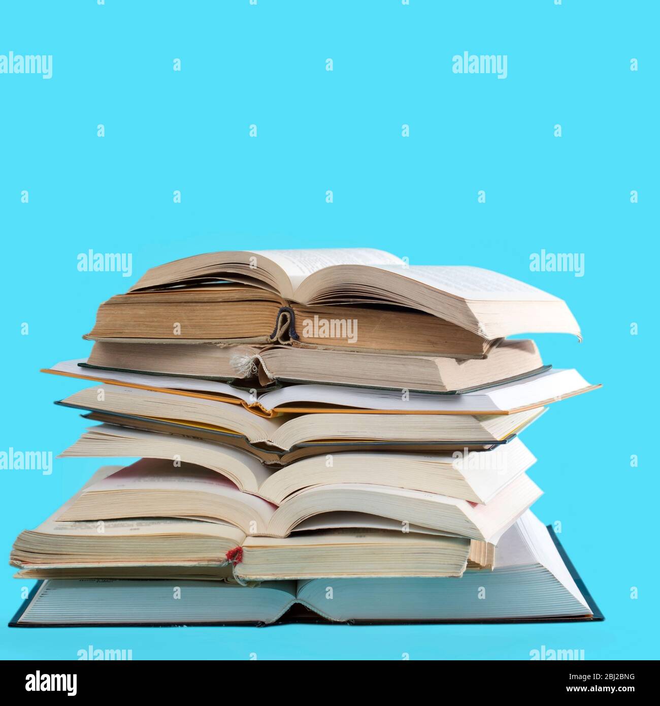 many stacks of educational open books for learning preparation for ...