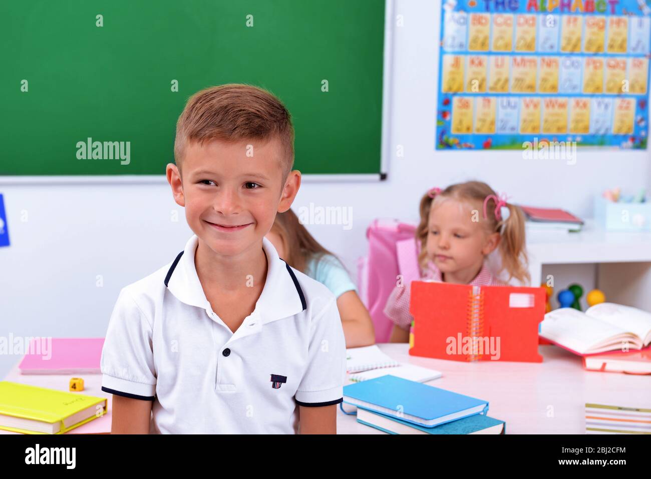 Group of children in the classroom Stock Photo - Alamy
