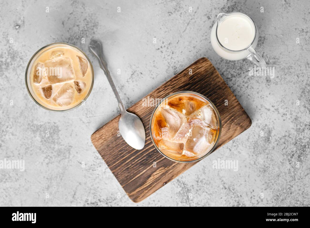 Top view of iced coffee with fat cream in rocks glass Stock Photo - Alamy