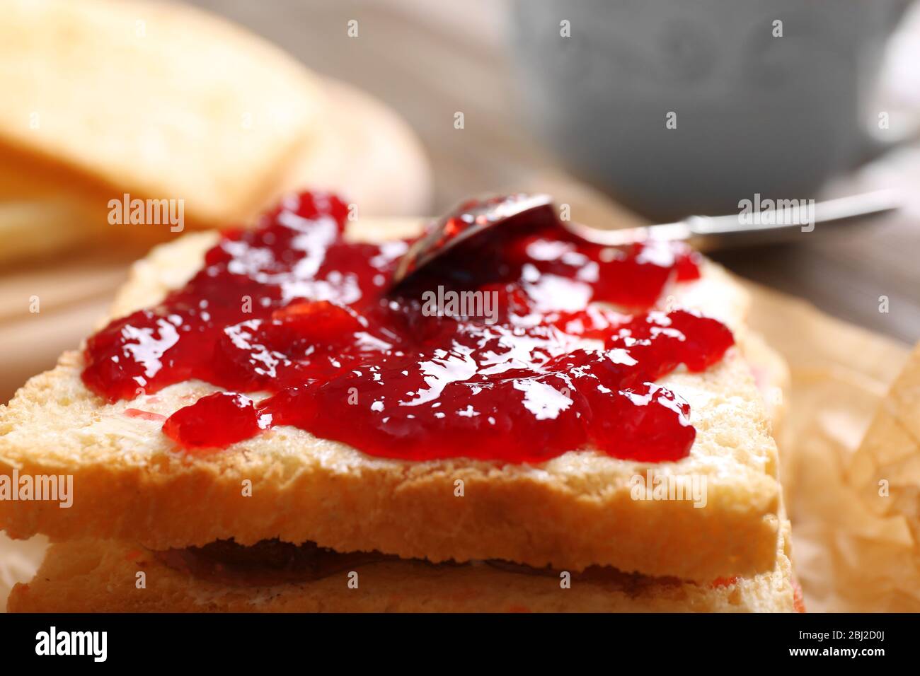 Bread with butter and homemade jam, closeup Stock Photo - Alamy