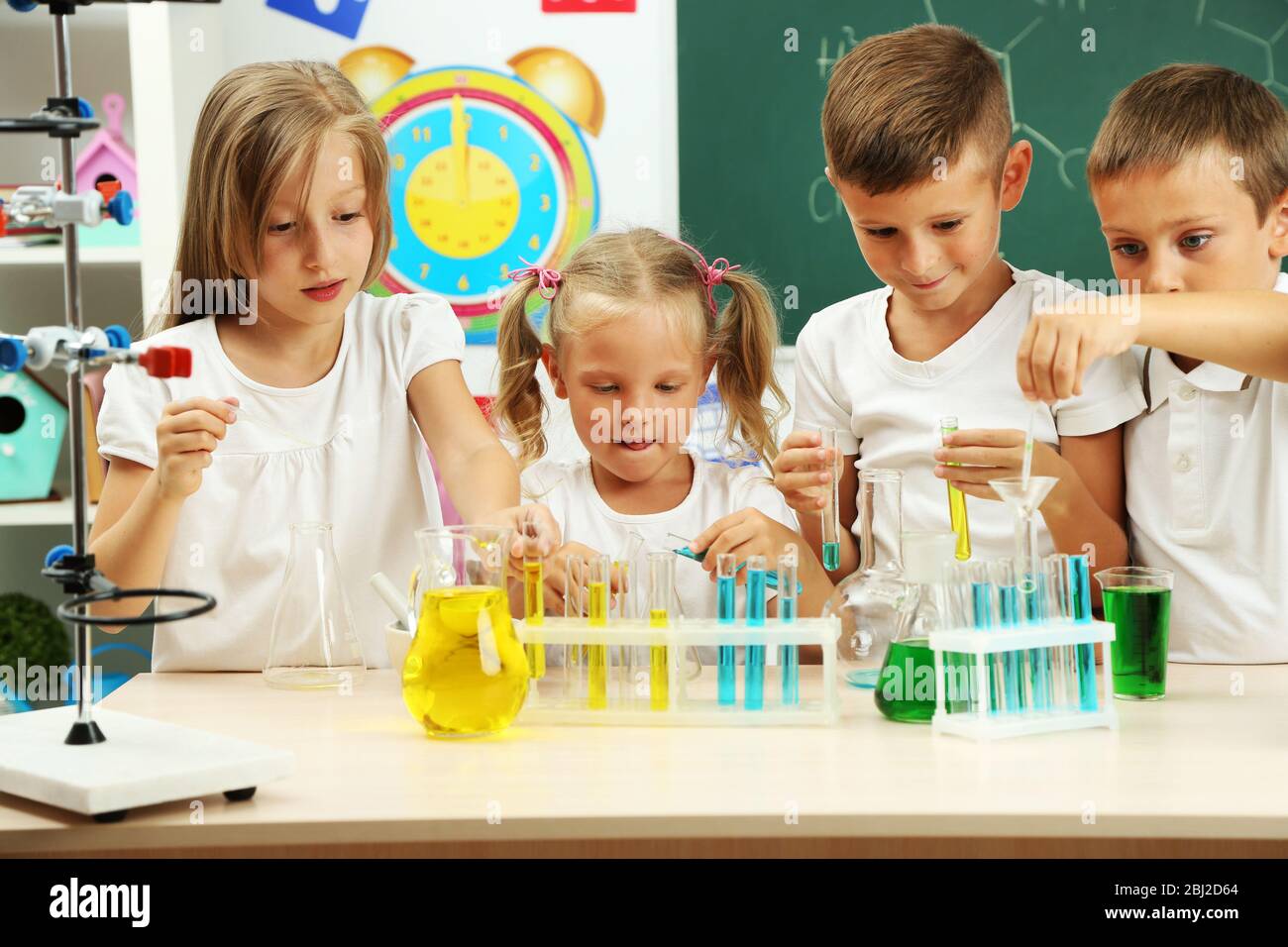 Cute pupils doing biochemistry research in chemistry class Stock Photo ...