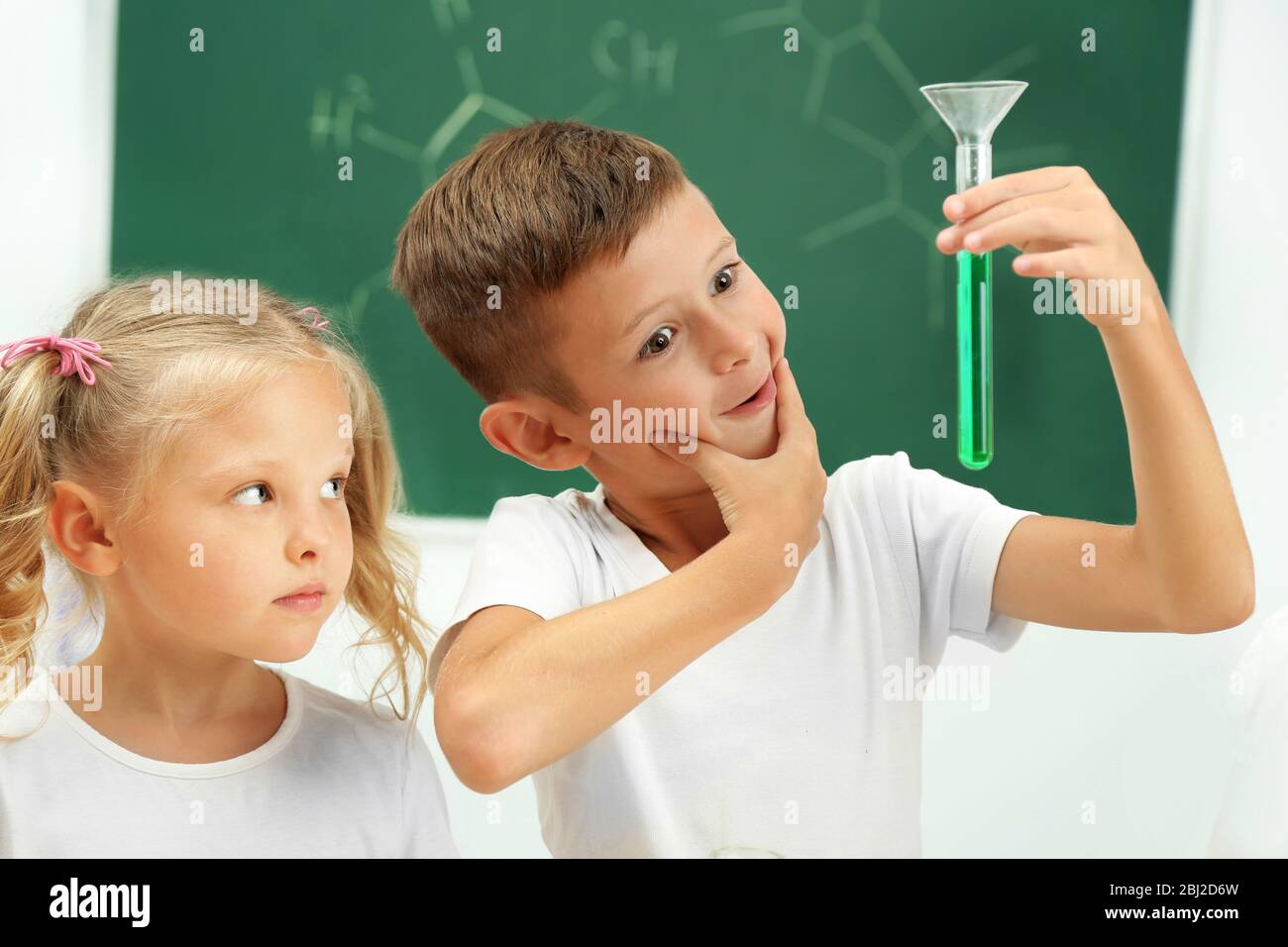 Cute pupils doing biochemistry research in chemistry class Stock Photo ...