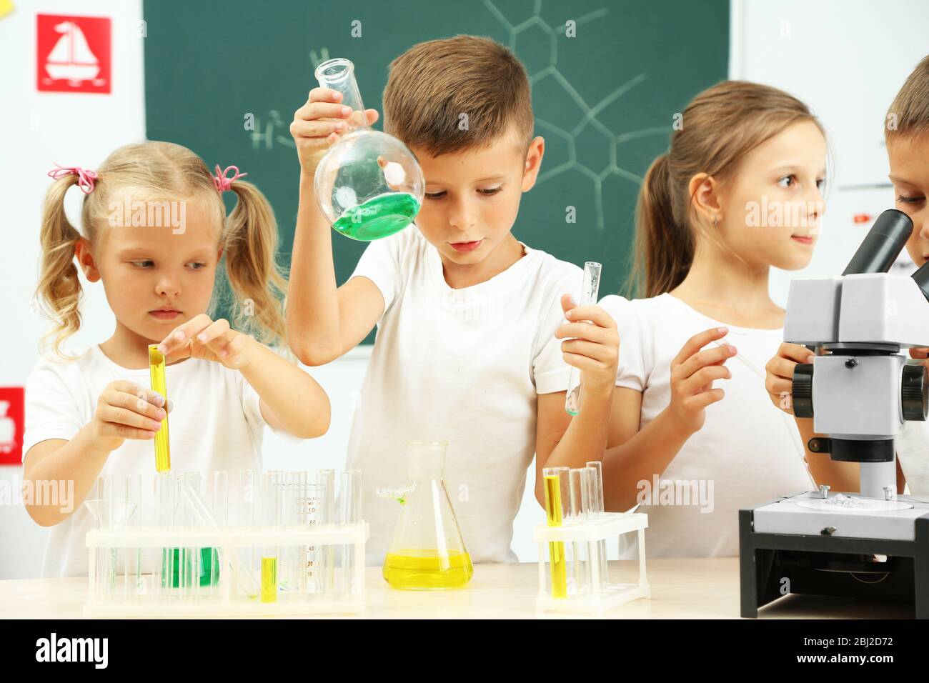 Cute pupils doing biochemistry research in chemistry class Stock Photo ...