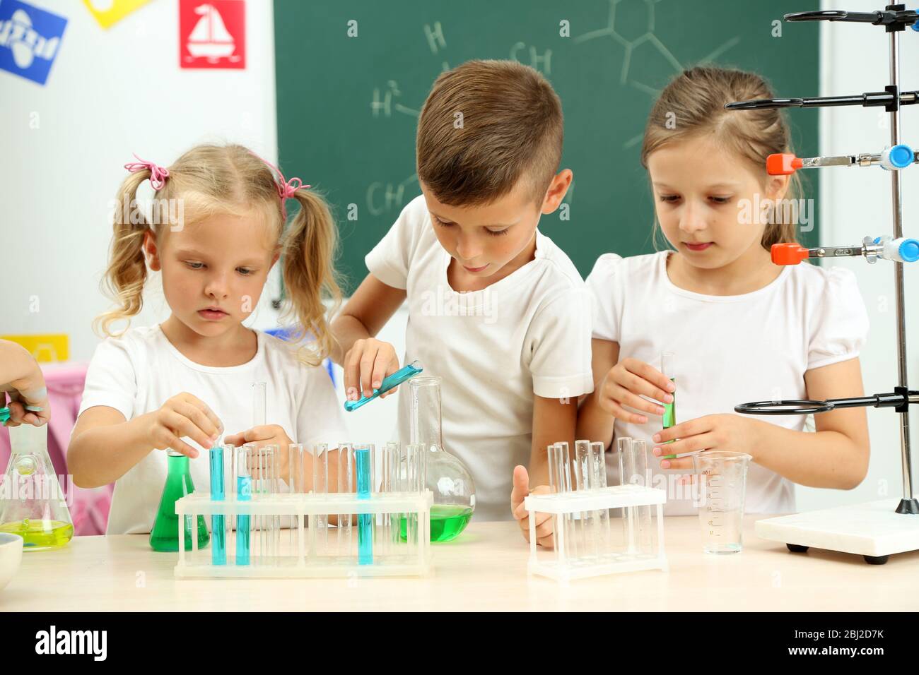 Cute pupils doing biochemistry research in chemistry class Stock Photo ...