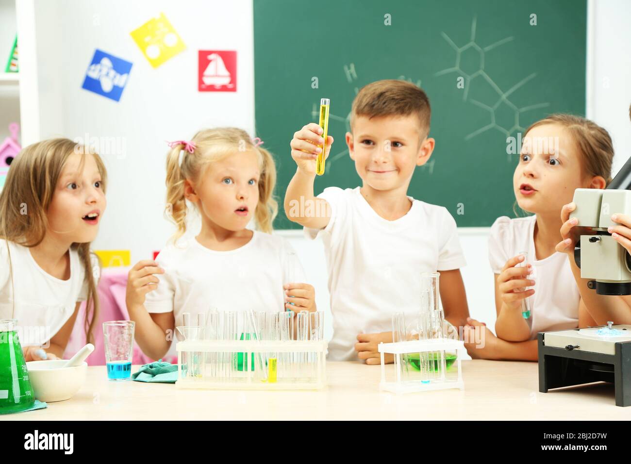 Cute pupils doing biochemistry research in chemistry class Stock Photo ...