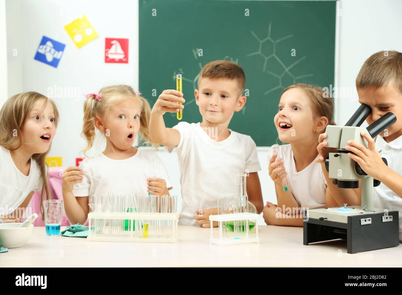 Cute pupils doing biochemistry research in chemistry class Stock Photo ...