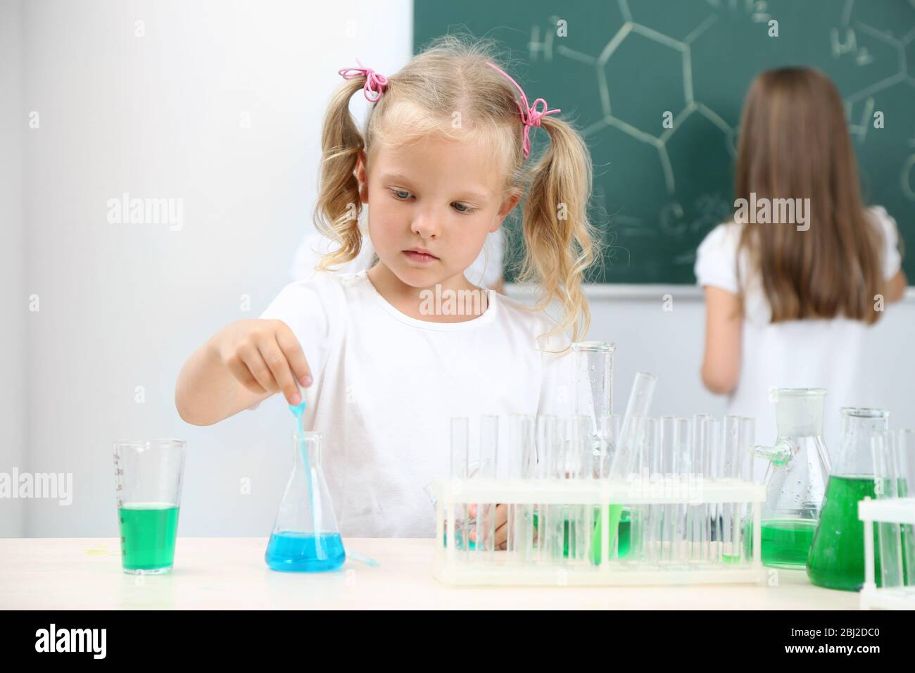 Cute pupils doing biochemistry research in chemistry class Stock Photo ...