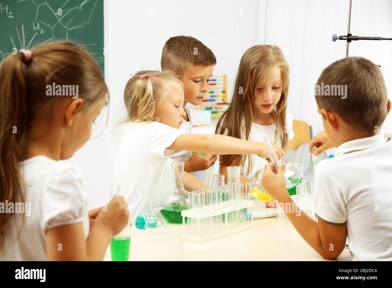Cute pupils doing biochemistry research in chemistry class Stock Photo ...
