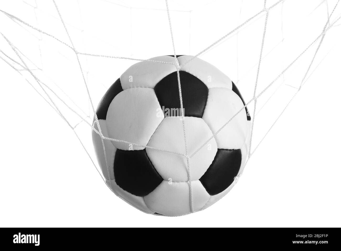 Soccer ball in the net isolated on white Stock Photo - Alamy