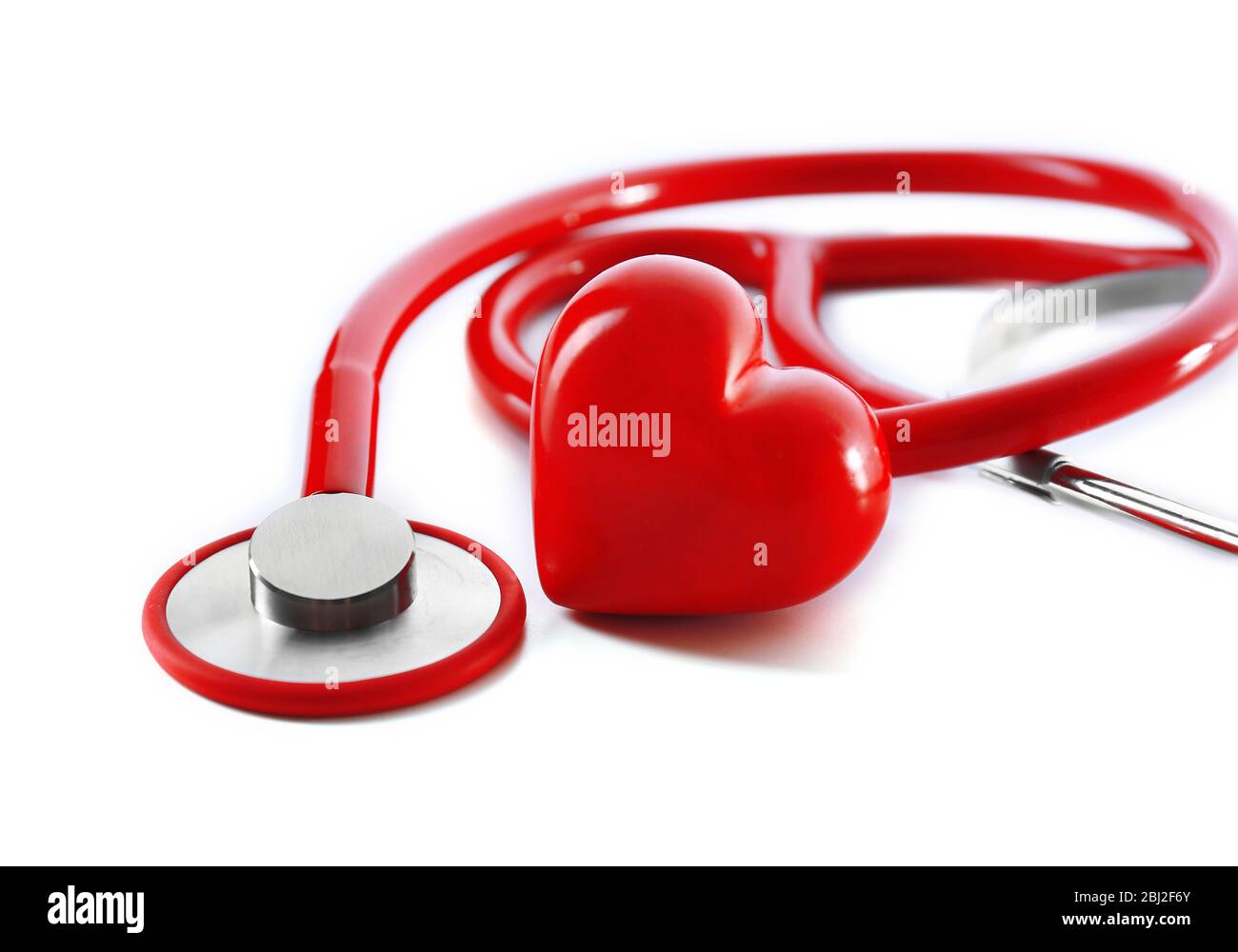 red stethoscope with heart isolated on white Stock Photo - Alamy