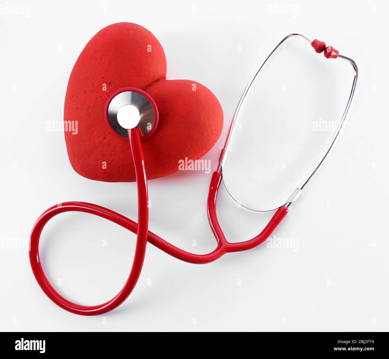 red stethoscope with heart isolated on white Stock Photo - Alamy