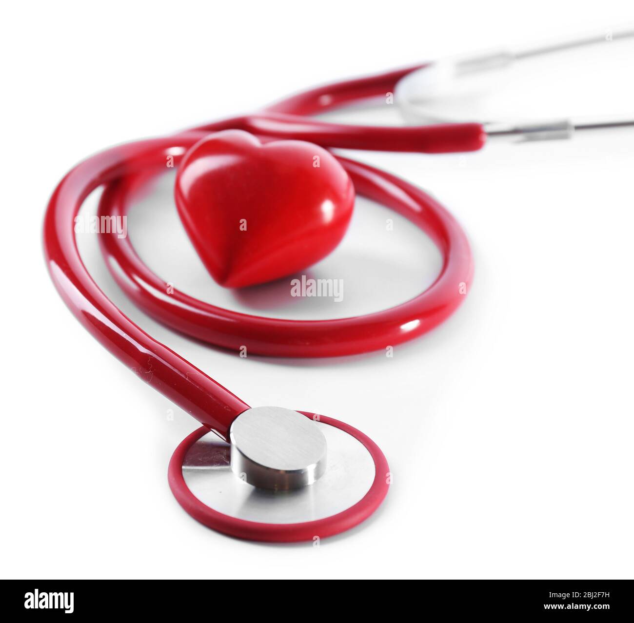red stethoscope with heart isolated on white Stock Photo - Alamy