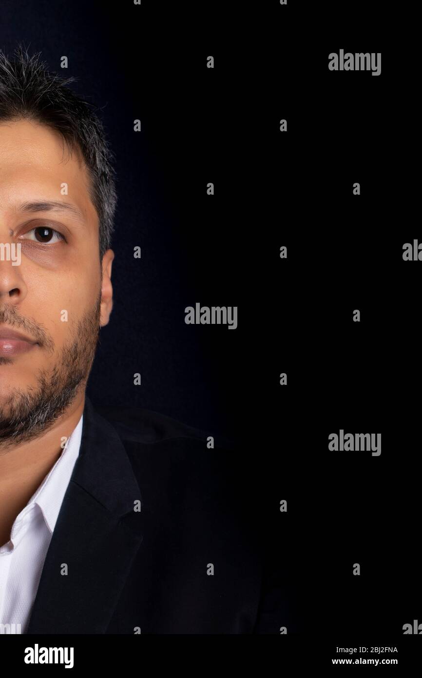 Half face portrait of handsome man smiling with little beard and with ...