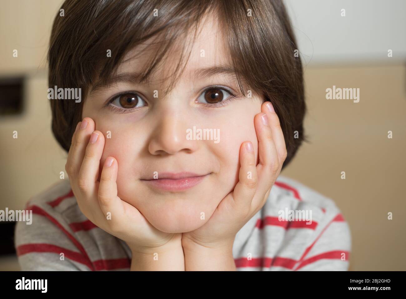 Face resting on hands hi-res stock photography and images - Alamy