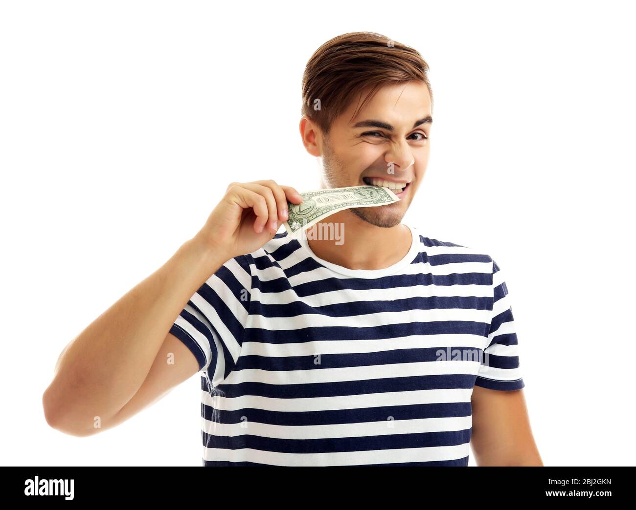 Handsome young man holding money isolated on white Stock Photo - Alamy