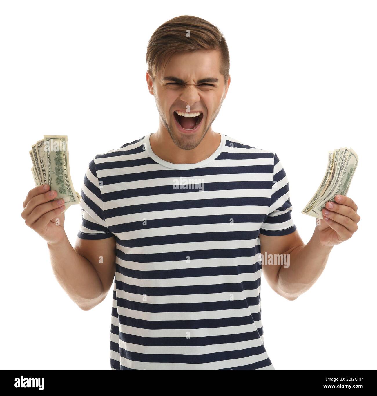Handsome young man holding money isolated on white Stock Photo - Alamy