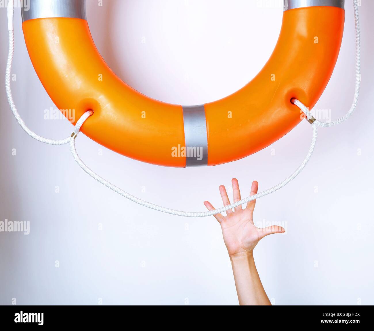 Human hand reaching for life preserver, isolated on white Stock Photo ...