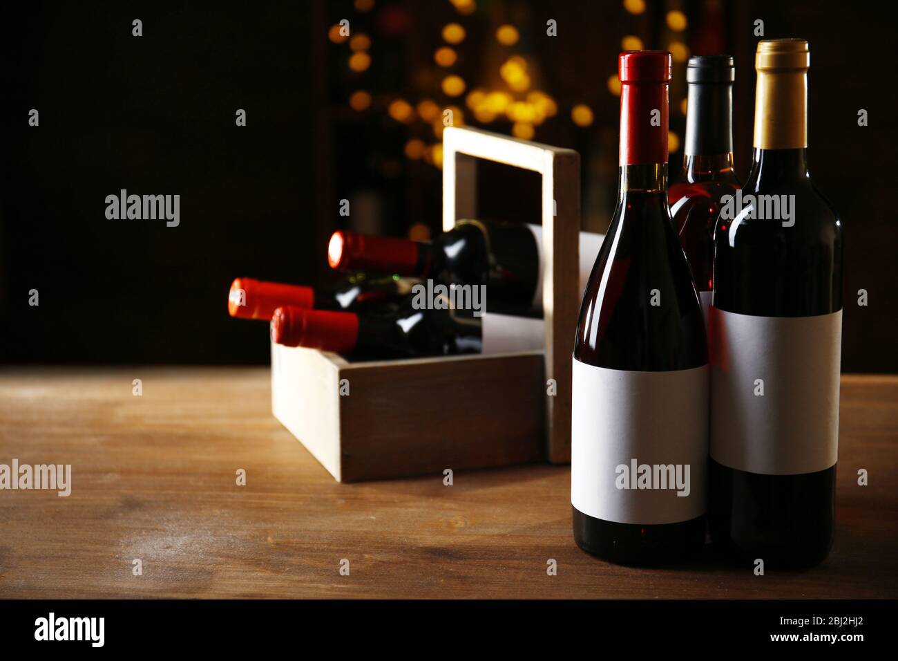 Luxury wine bottles on the table Stock Photo - Alamy