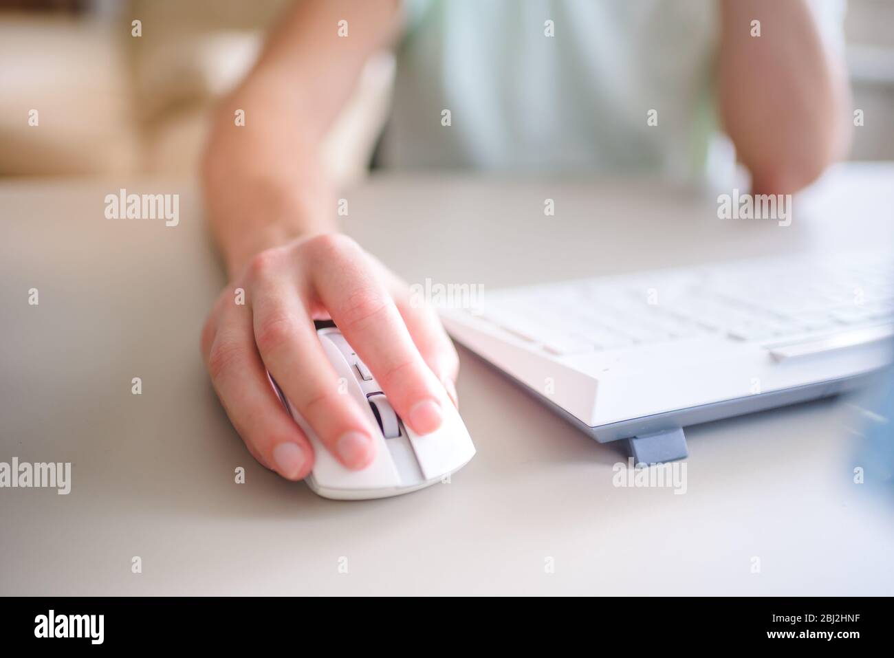 close up hand man using mouse and computer at home Stock Photo - Alamy