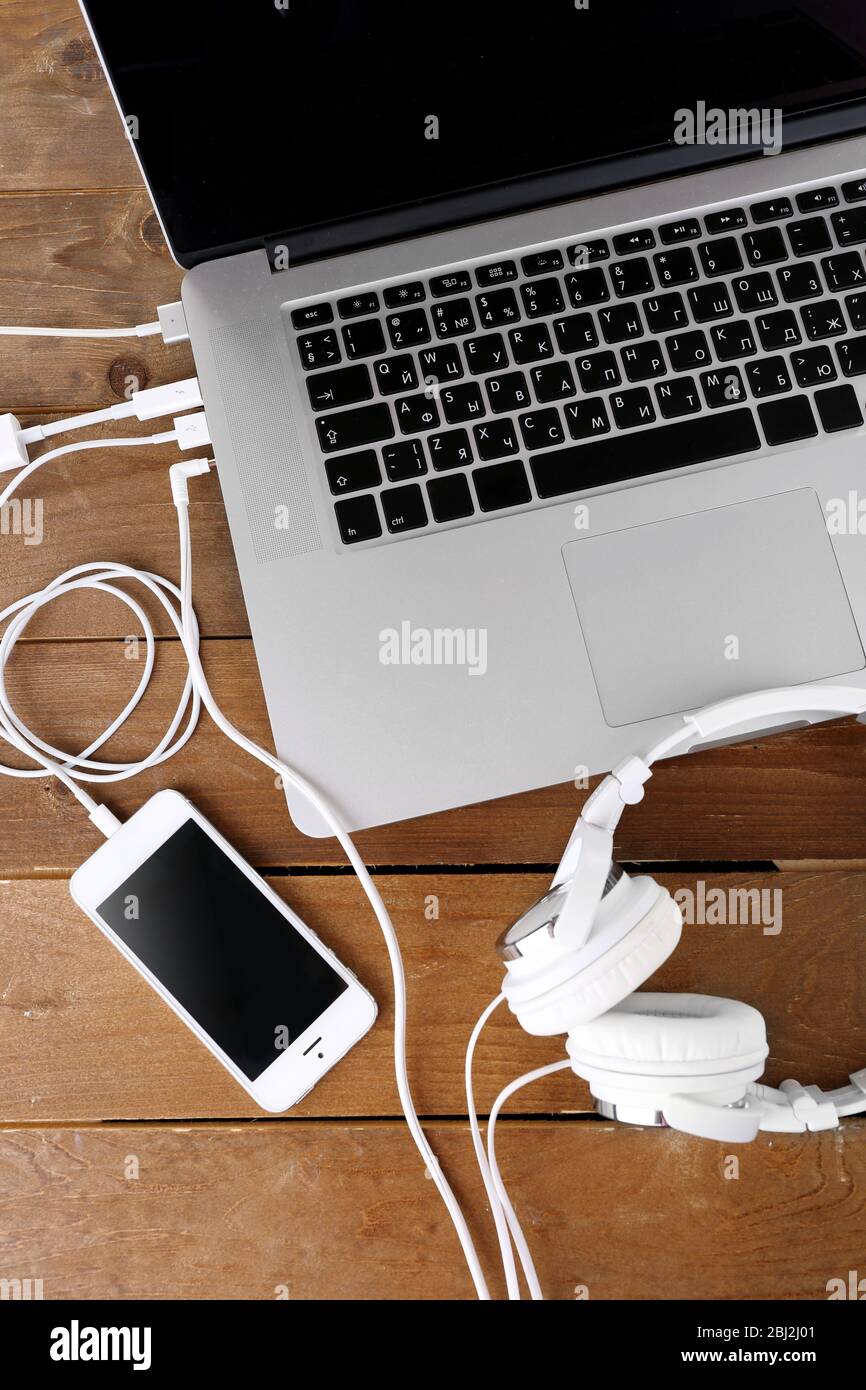 Computer peripherals and laptop accessories on wooden background Stock ...