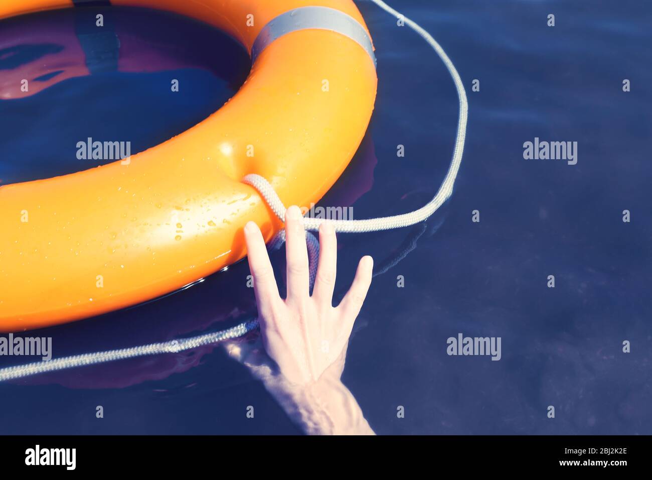 Life buoy hand hi-res stock photography and images - Alamy