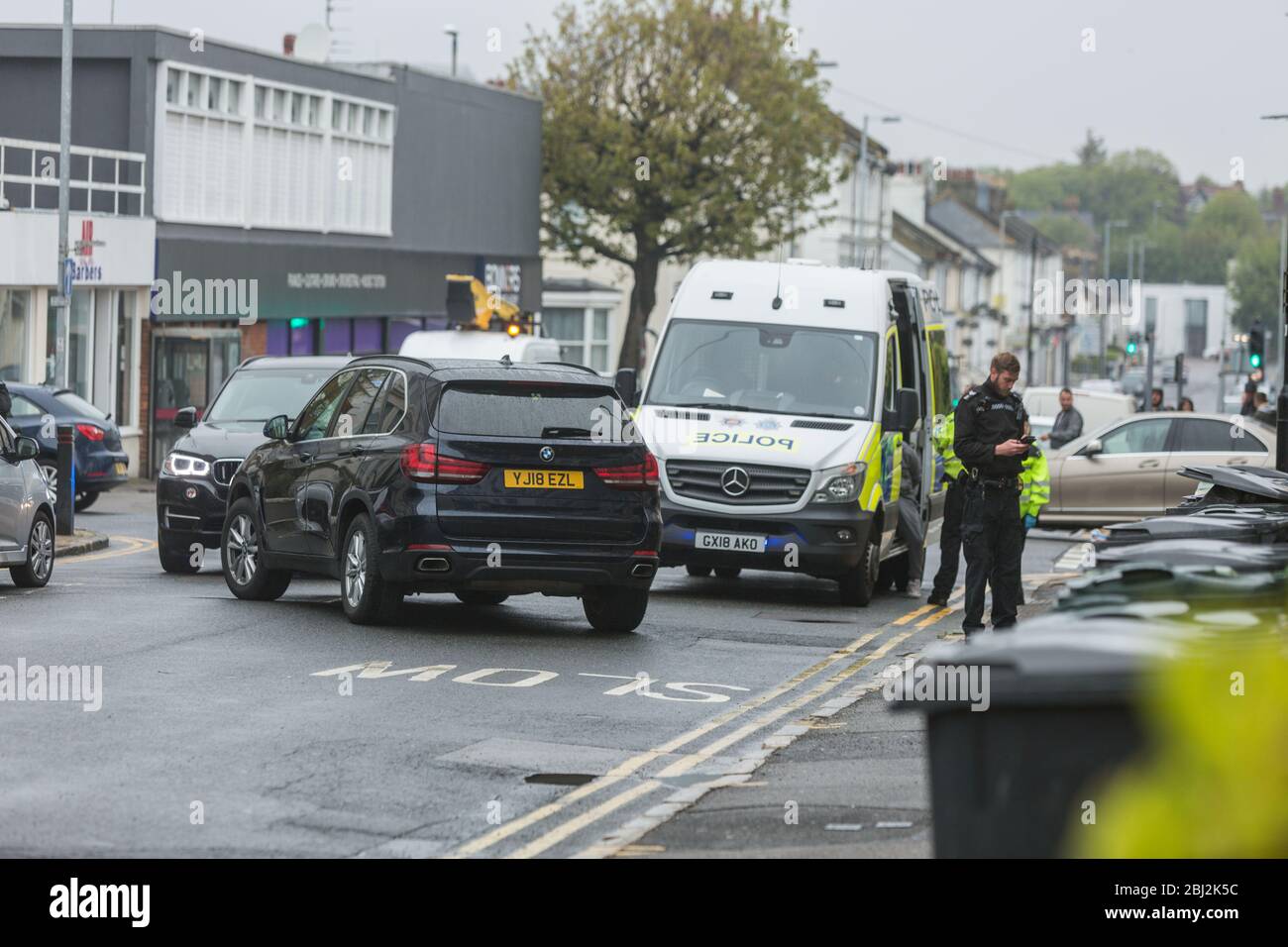 Eastbourne, England. 28 Apr 2020. Armed police car and police van ...