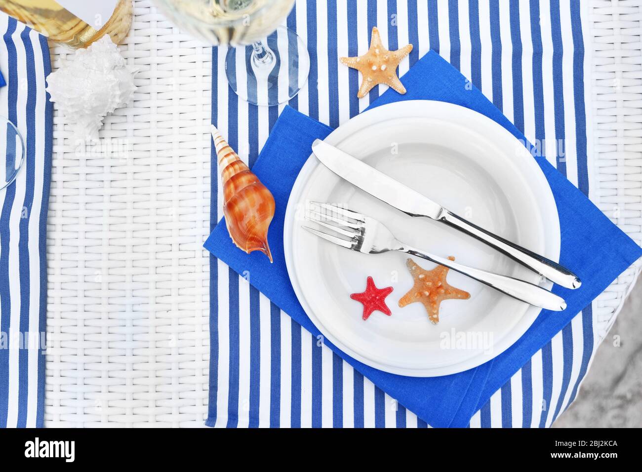 Table setting decorated in marine style Stock Photo - Alamy