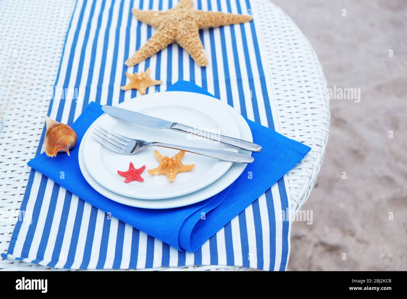 Table setting decorated in marine style Stock Photo - Alamy