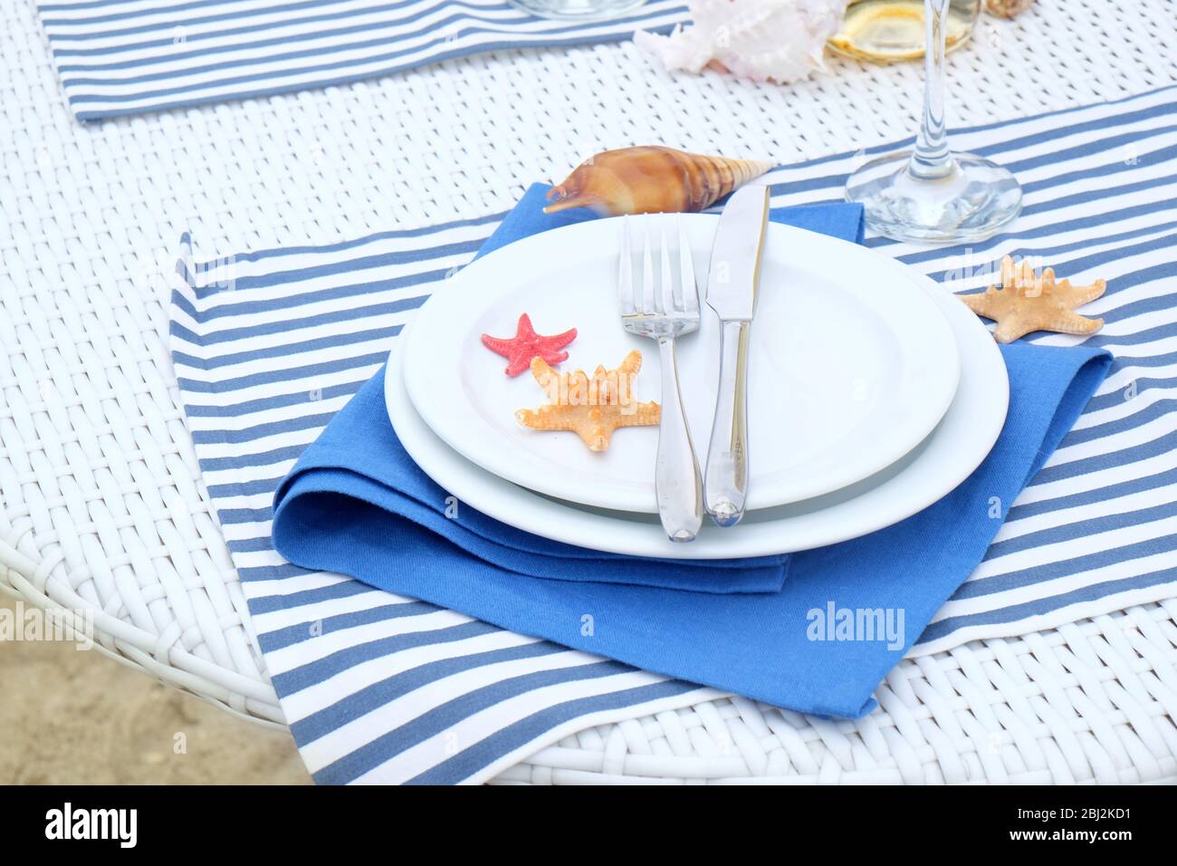 Table setting decorated in marine style Stock Photo - Alamy